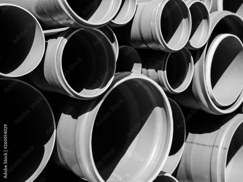 Sewage pipes close up shot in black and white, image for background ...