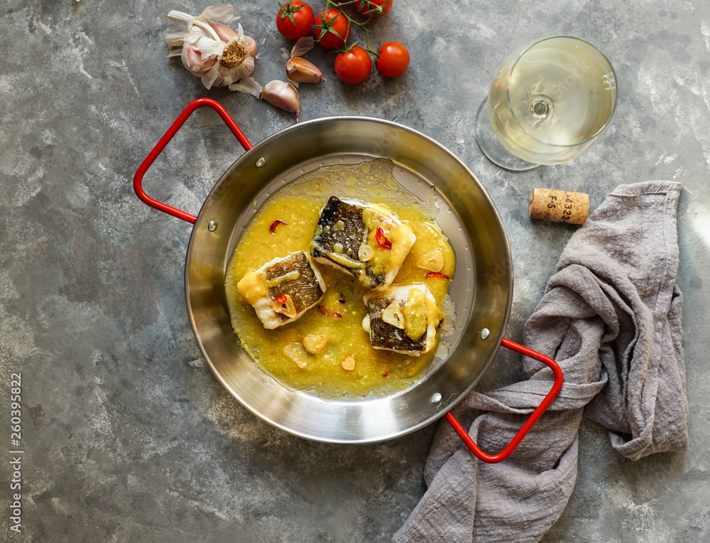 bacalao al pil pil, salted cod in emulsified olive oil sauce, spanish ...