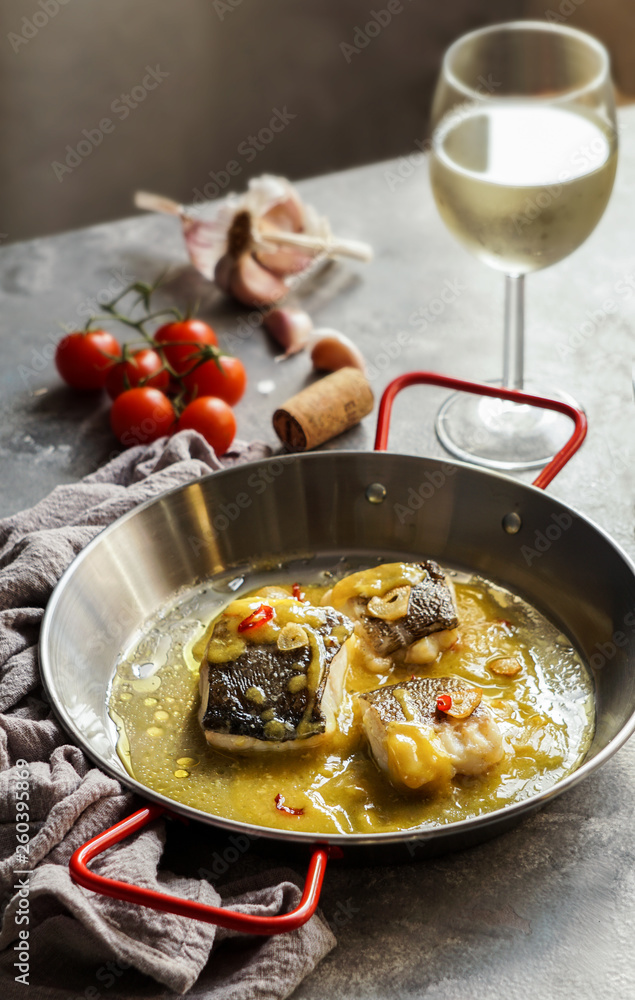 bacalao al pil pil, salted cod in emulsified olive oil sauce, spanish ...