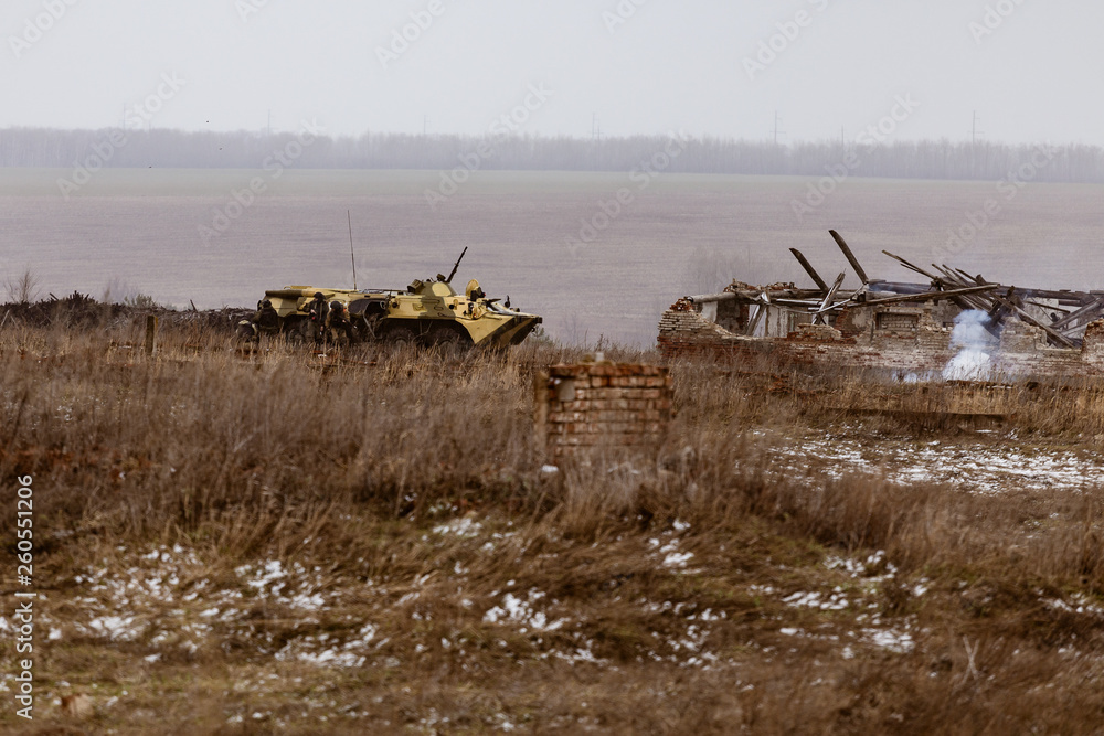 Russian counter-terrorist unit under the cover of armored vehicles ...