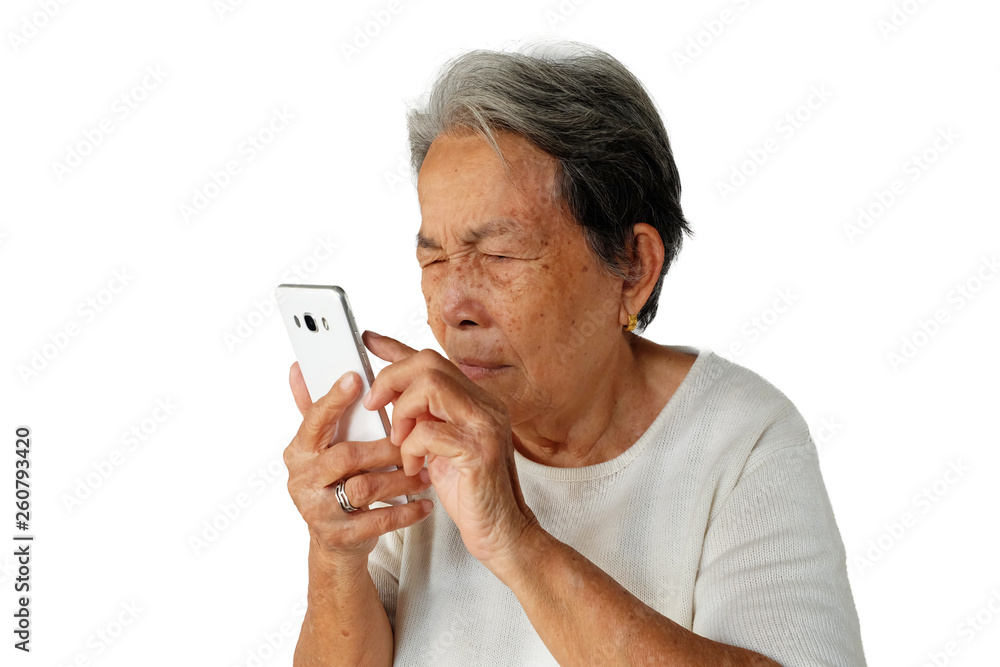 Elderly asian woman are holding and looking mobile phone with poor ...