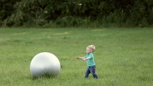Little Girl Running With Big Ball Free Stock Photo - Public Domain Pictures