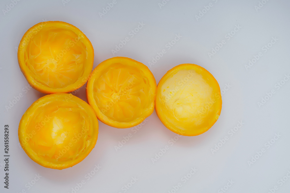 Orange skin after fresh squeezed juice. Half an orange without pulp on ...