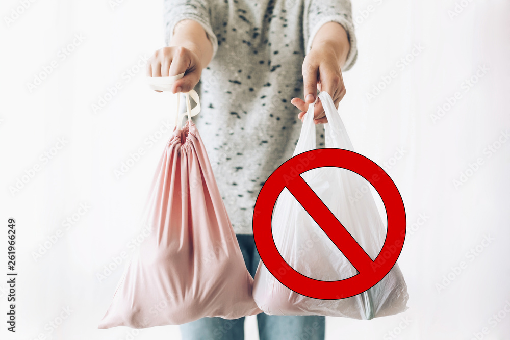 Ban single use plastic, stop sign. Zero Waste shopping concept. Woman ...