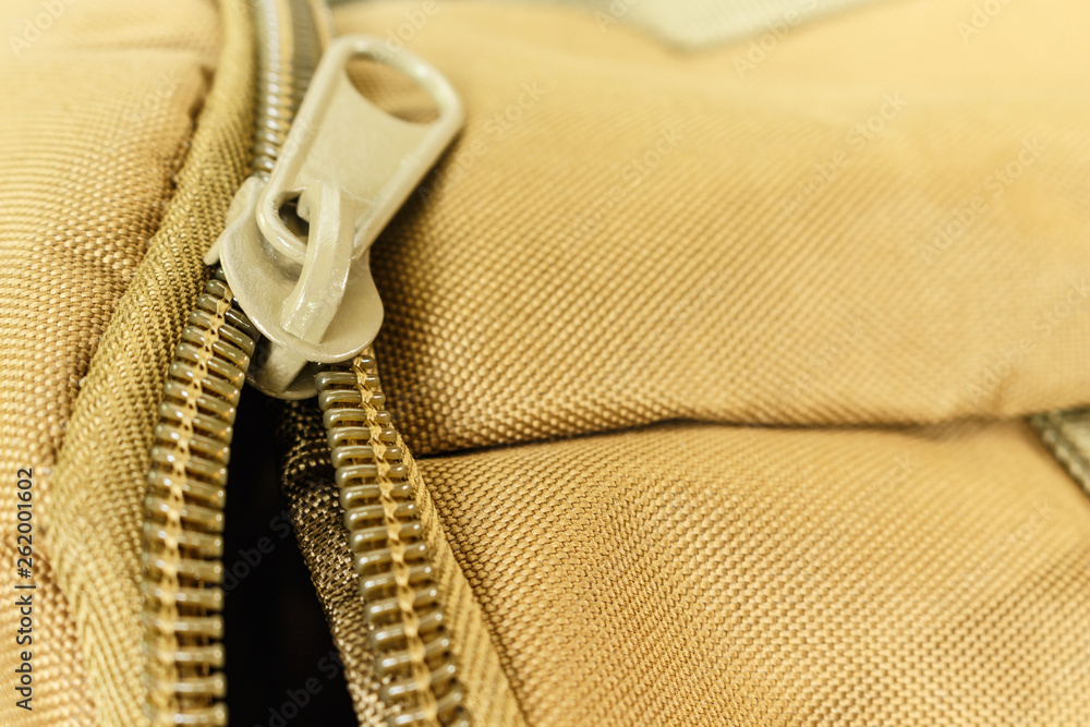 zipper bag color khaki texture. Stock Photo | Adobe Stock