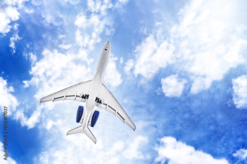 aerial view of business jet airplane air travel against cloud blue sky ...