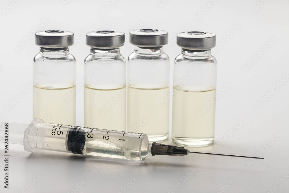 Subcutaneous syringe. Syringes with blue needles. Medical Injectors ...