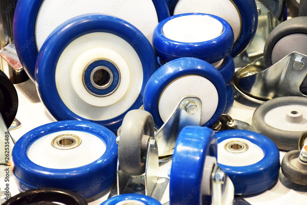 Industrial blue urethane on the plastic core wheels. Group of different ...