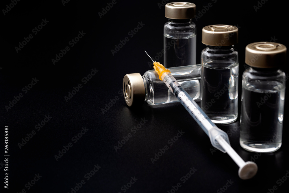 Stock-Foto „Vaccines, botulinum toxin and insulin ampules concept theme with glass vials with ...