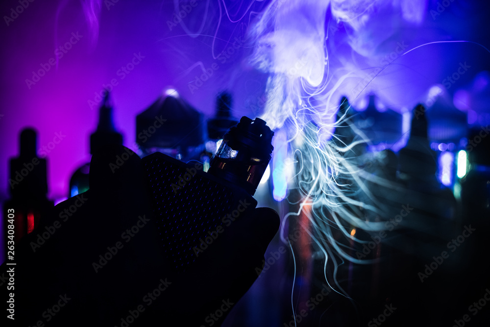 Vape concept. Electronic Cigarette vape explosion. Smoke clouds and ...