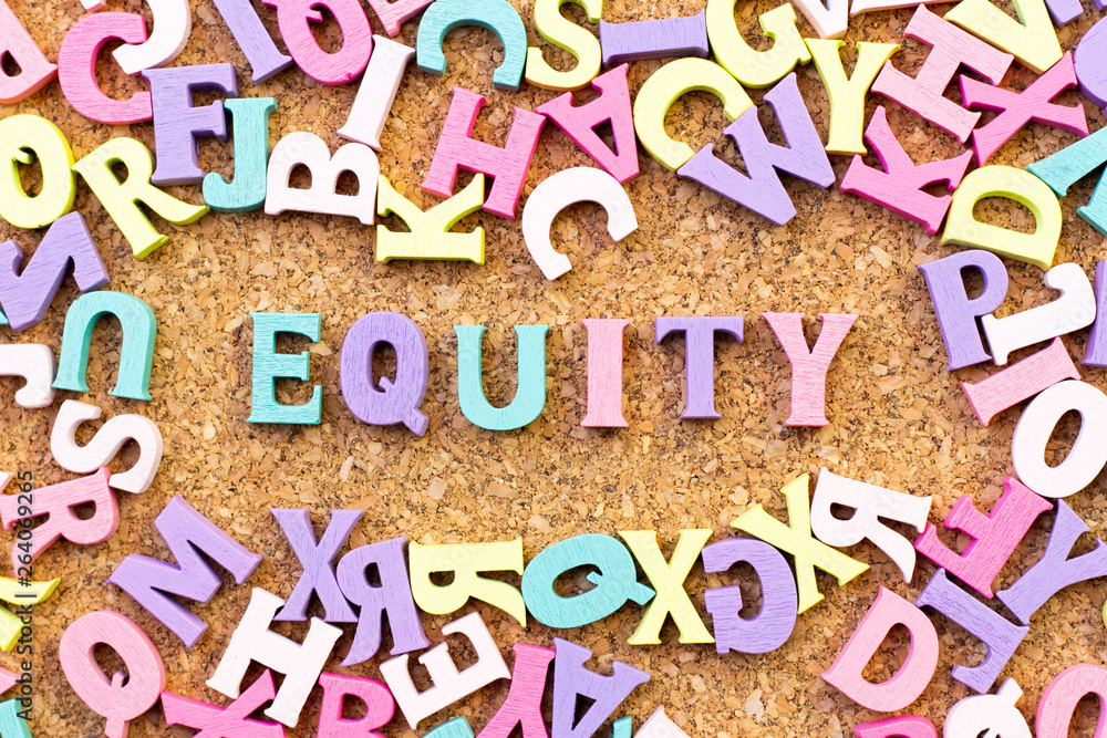 Color alphabet in word equity with another letter as frame on cork ...
