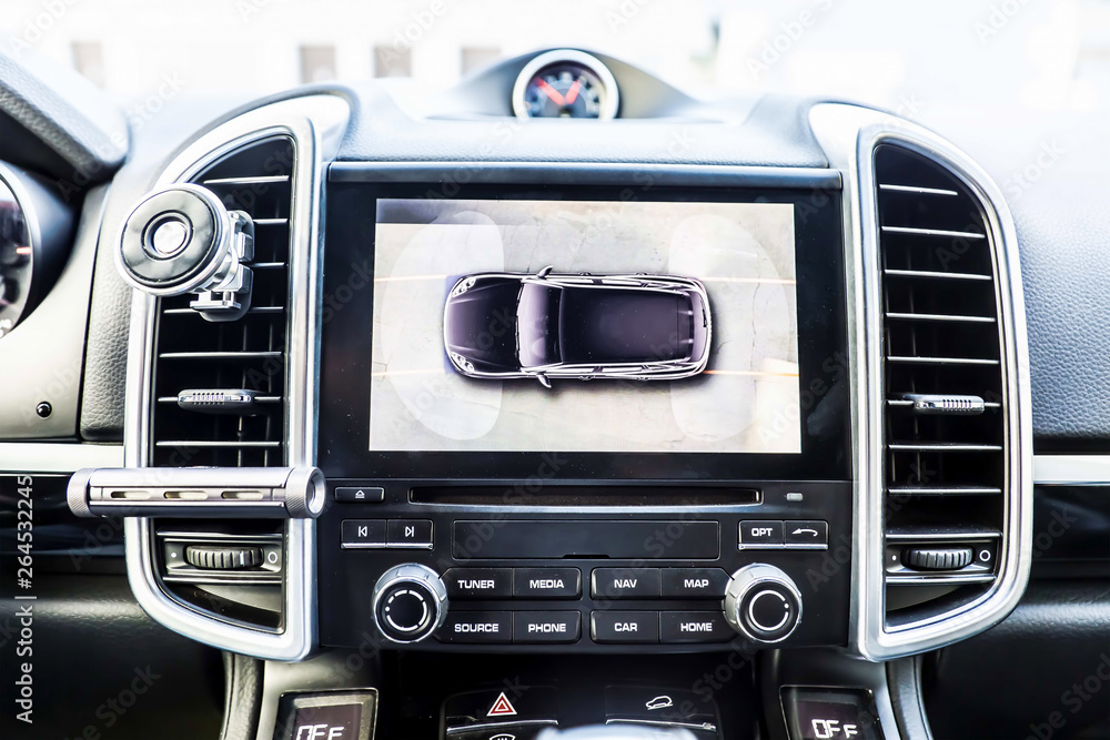 Top view, Display in interior of luxury car shows working of four ...