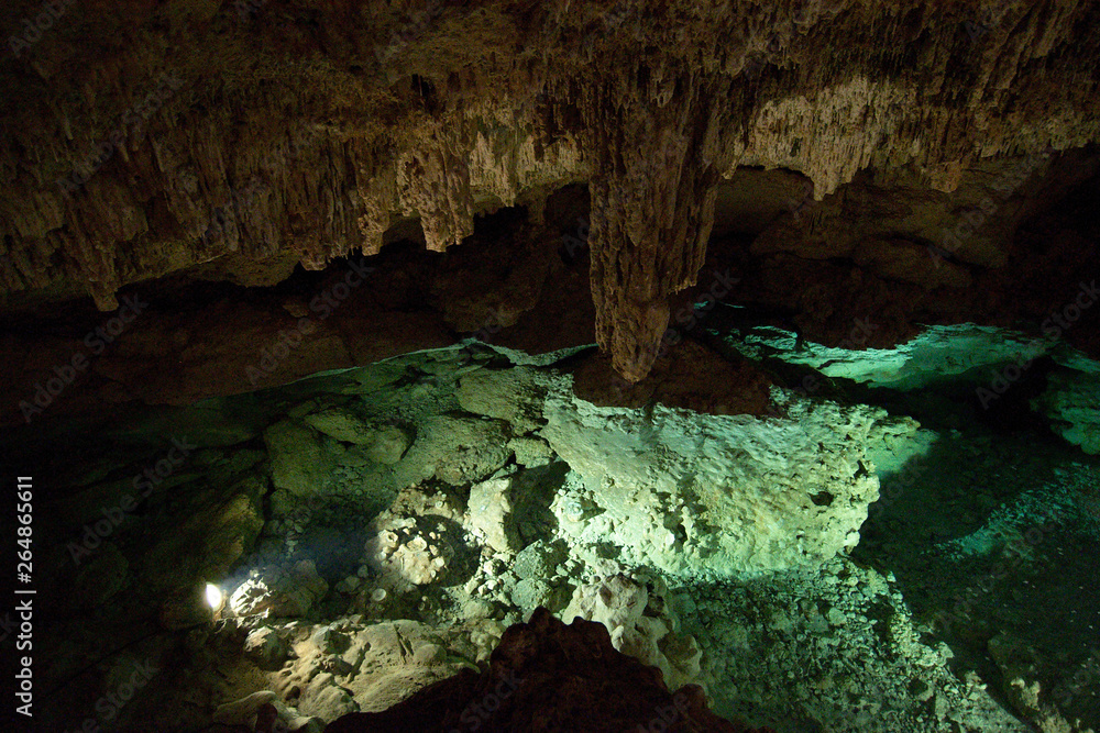 Interior of a cenote (underground river sinkhole) located in Hacienda ...