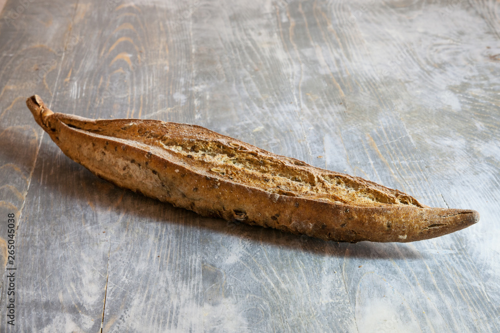 Stock-Foto „Traditional French baguette, a ficelle flute type, a thin ...