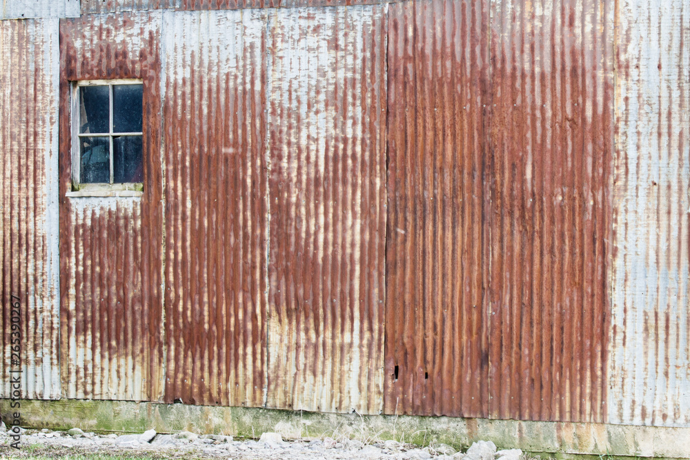 Steel wall of old shed with window; steel wall texture with rust ...