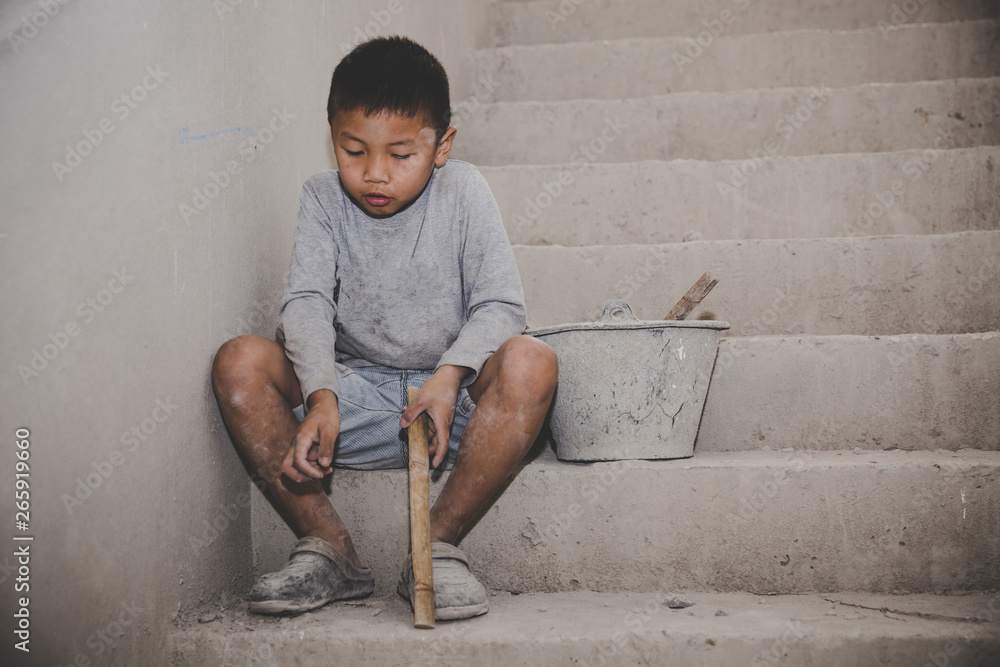 Little boys labor working in commercial building structure, World Day ...