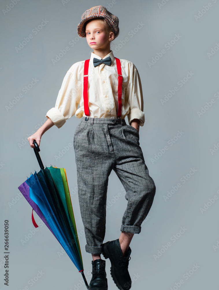 Stock-Foto „suspender and bow tie. old fashioned child in checkered ...