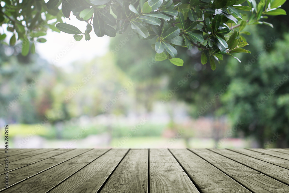 Wooden table and blurred green nature garden background. Stock Photo ...