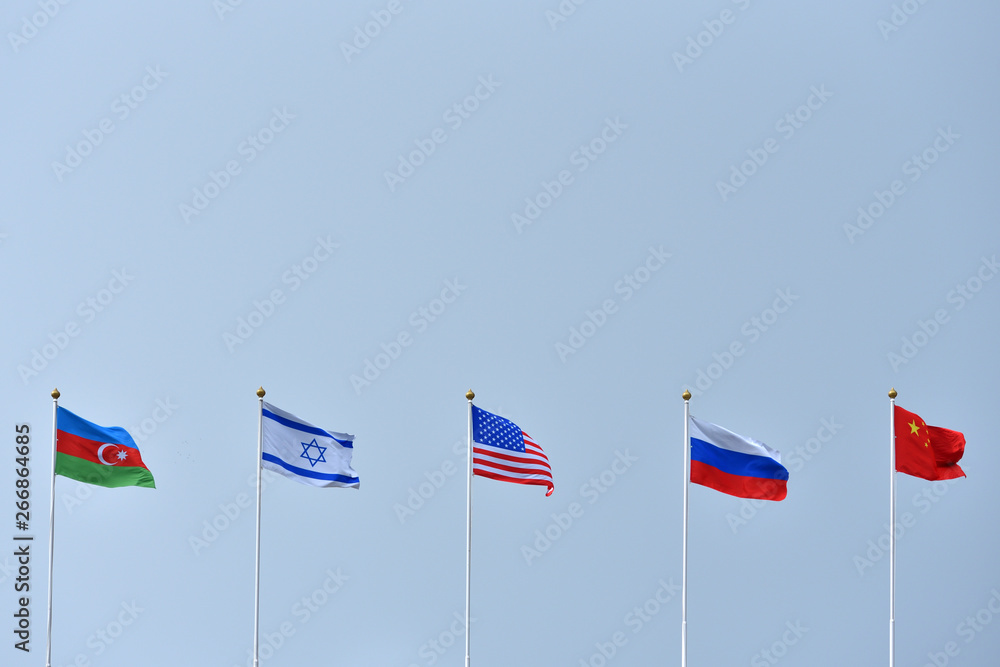 Five flags India, Israel, America, China and Russia against the sky ...