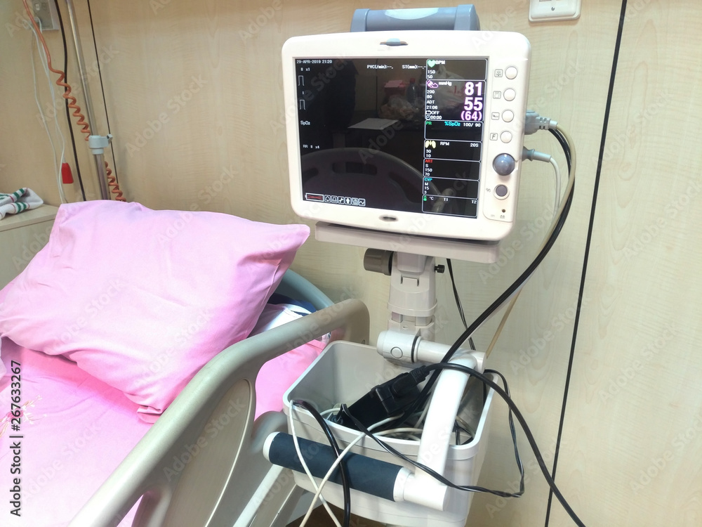 Vital signs monitoring display in ICU showing heart rate, pulse , and ...