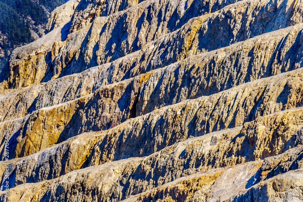 Stock-Foto „The terraced mountain side of a limestone Quarry in Marble ...