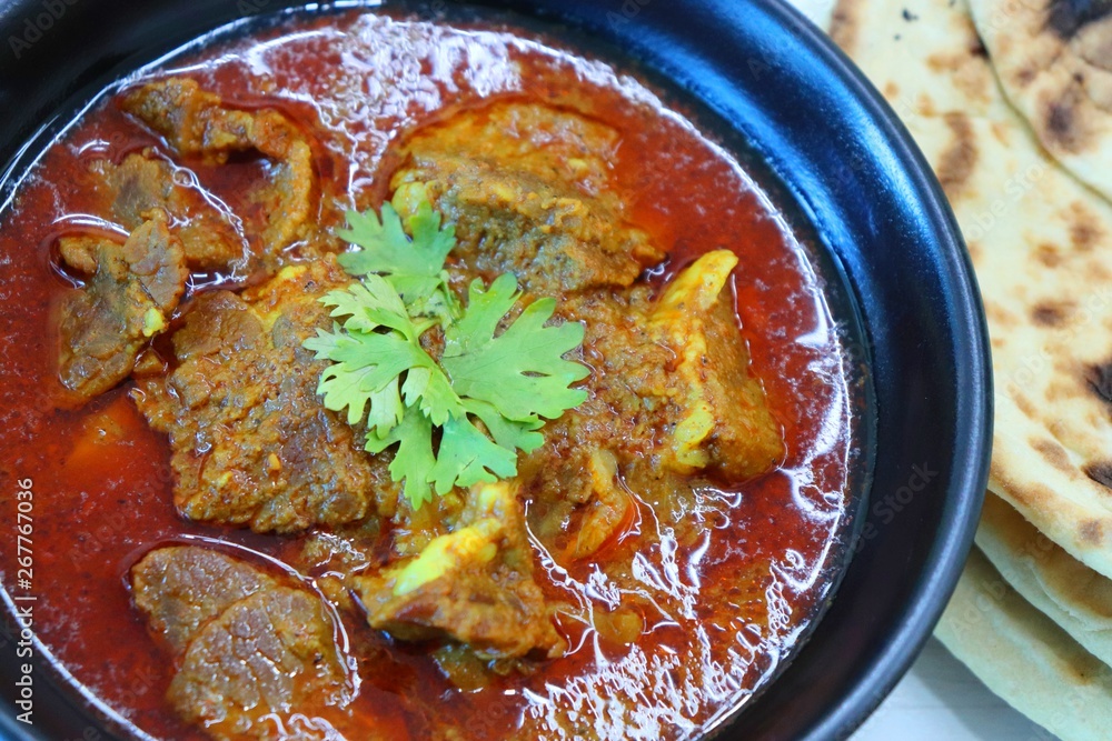 Mutton do Pyaza or Indian lamb Curry with some spices like black pepper ...