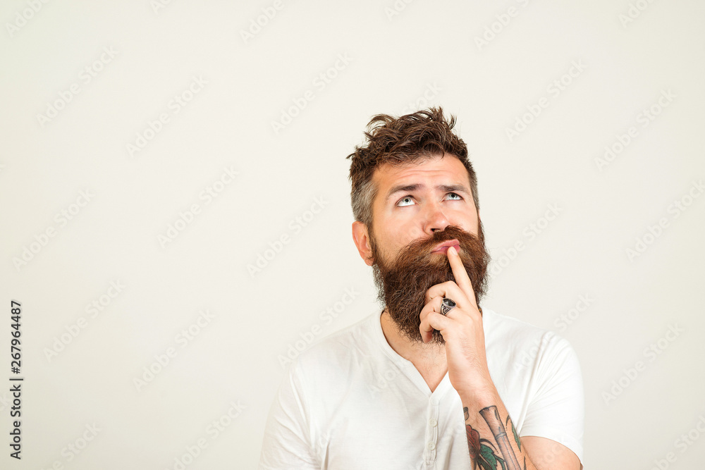 Smart handsome bearded guy having great plan or idea over white ...