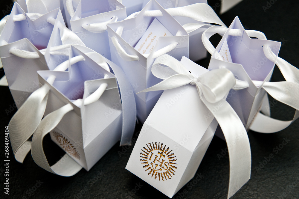 First holy communion boxes with thank you notes for guests. Stock Photo ...