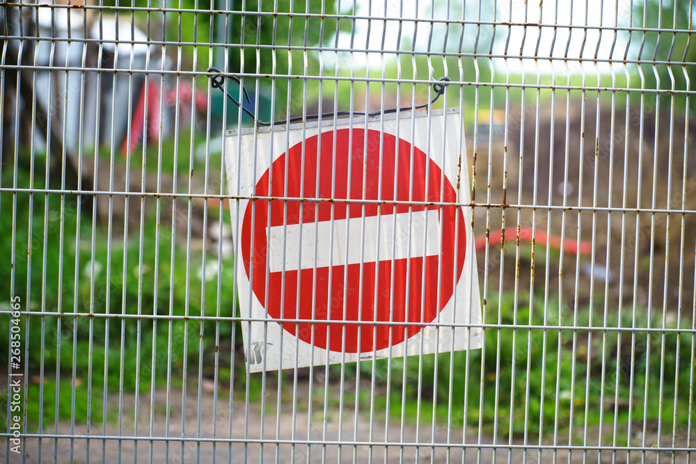 Photo Stock Red and White British No Entry Road Sign with Steel Fence ...