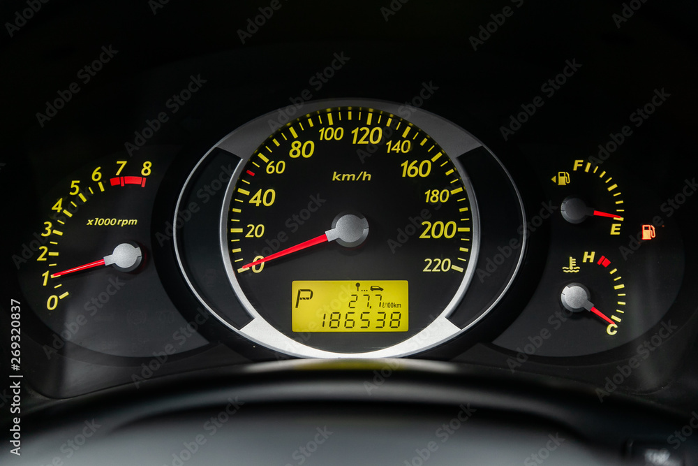 Сlose-up of the car black interior: dashboard, speedometer and ...