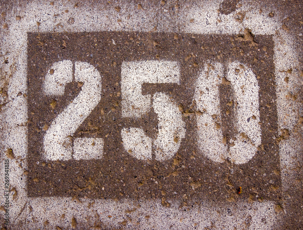 the numbers on the pavement 250 Stock Photo | Adobe Stock