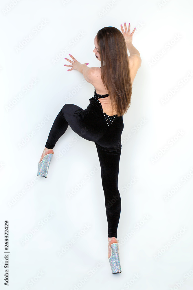 Photo Stock Sexy girl dancing strip on a light background. Sexy dance ...