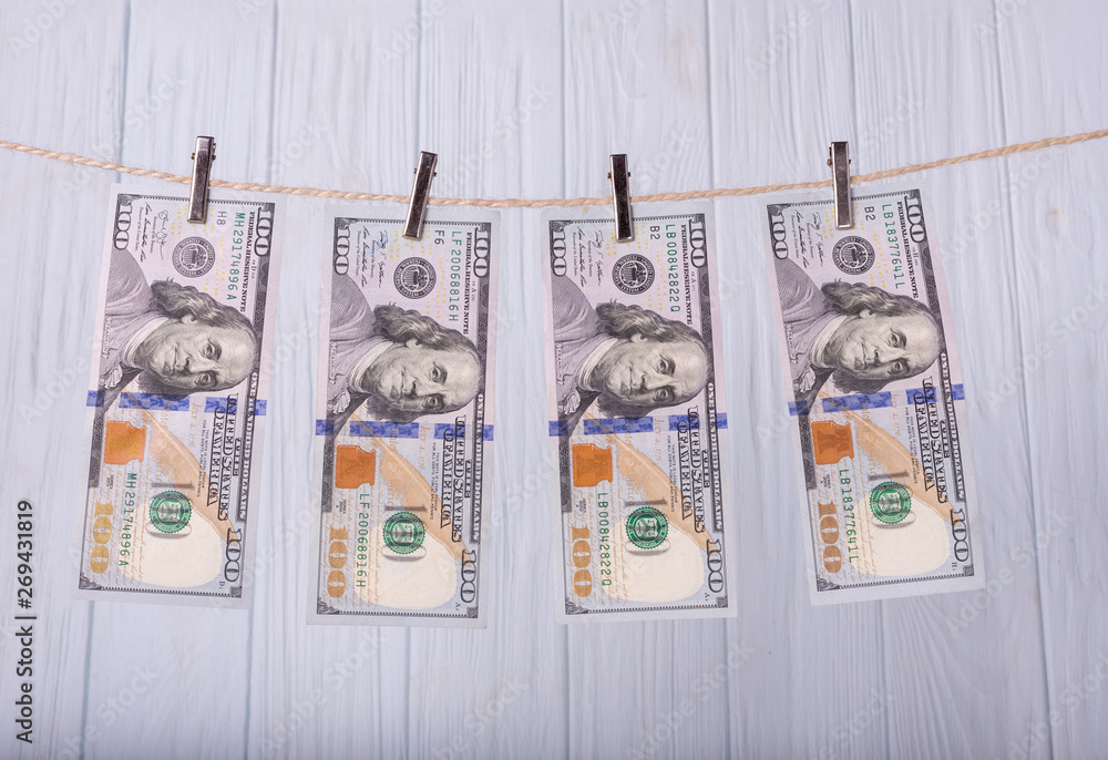 Money Laundering. Money Laundering US dollars hung out to dry. 100 ...