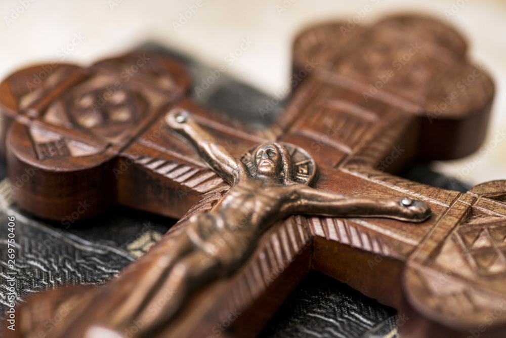 Jesus on the cross in church. Wooden cross with Jesus Christ ...