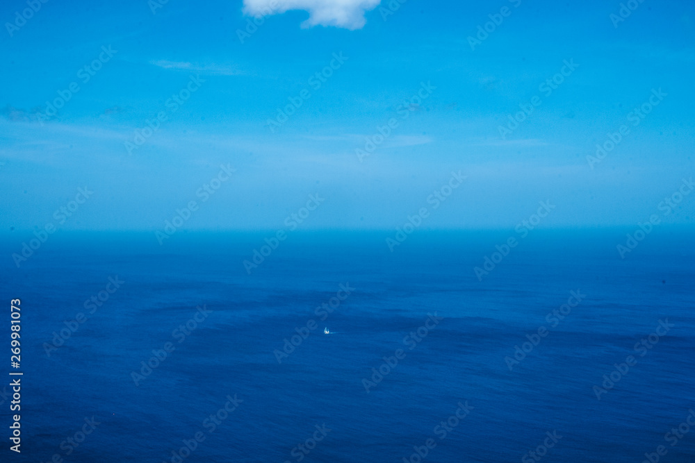 Blue sky meeting the blue ocean forming blue gradient background Stock ...