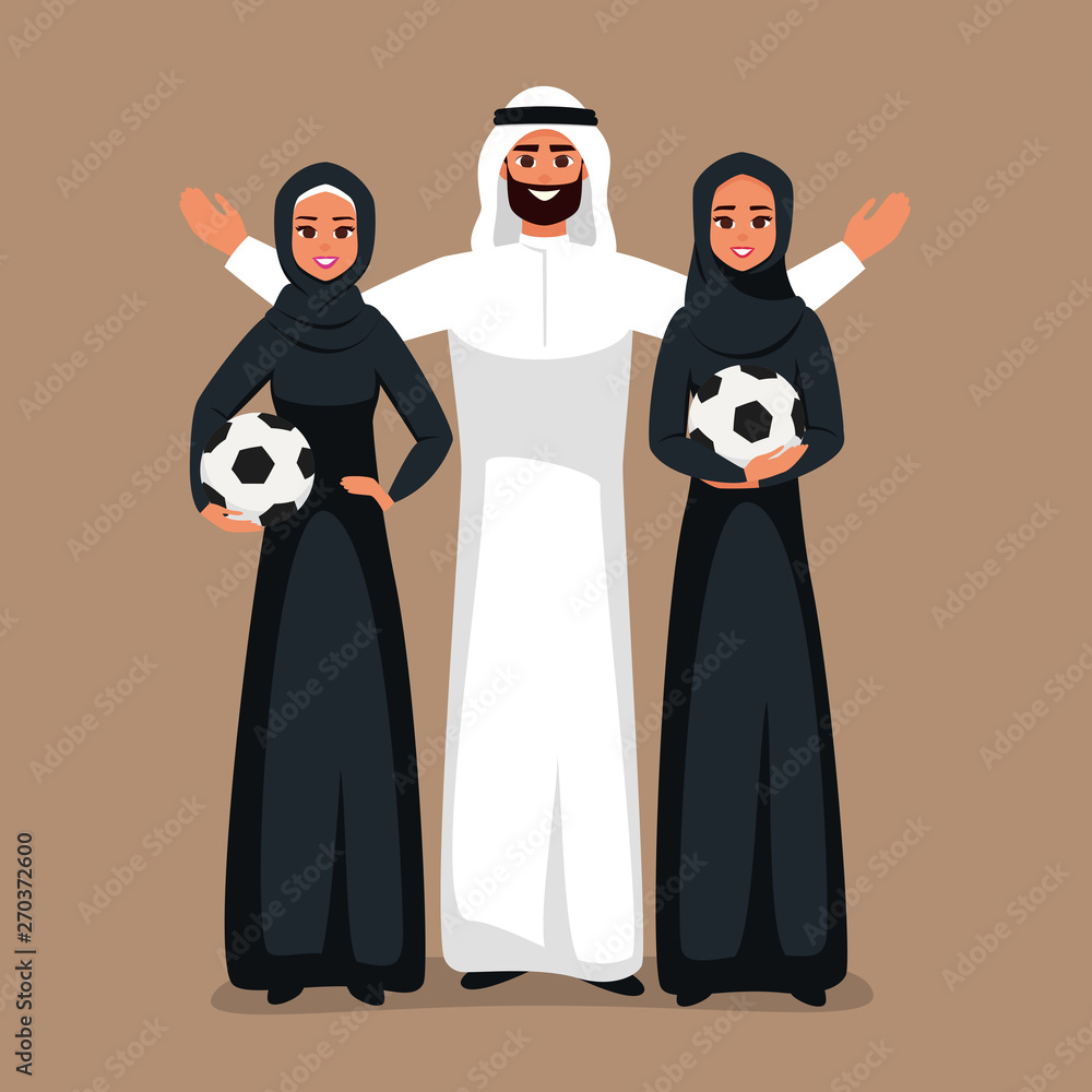Arab young women and arabian man standing together with soccer ball in ...