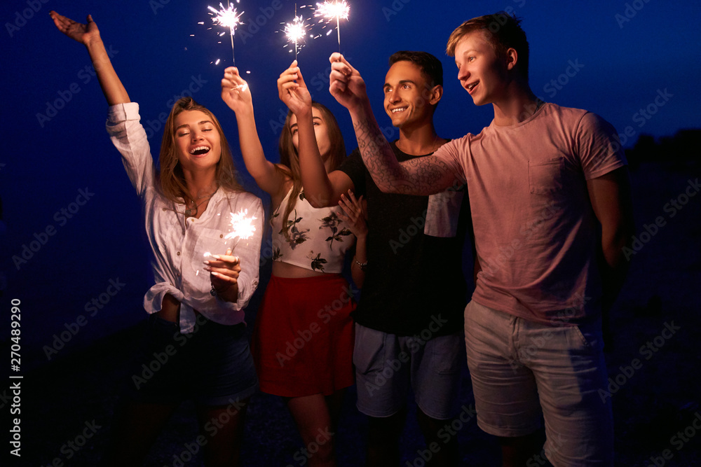 Friends walking, dancing and having fun during night party at the ...