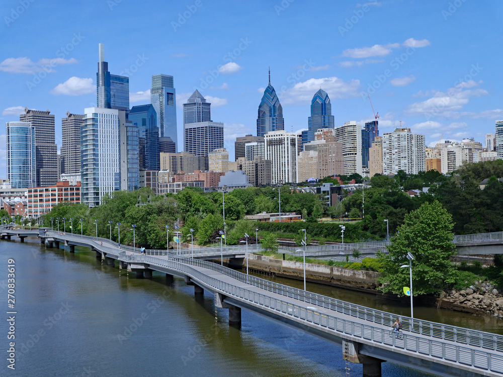 Philadelphia skyline in 2019 with recreational boardwalk along the ...