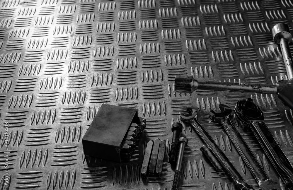 Tools on industrial metal checker plate. Metal checkerplate for anti ...
