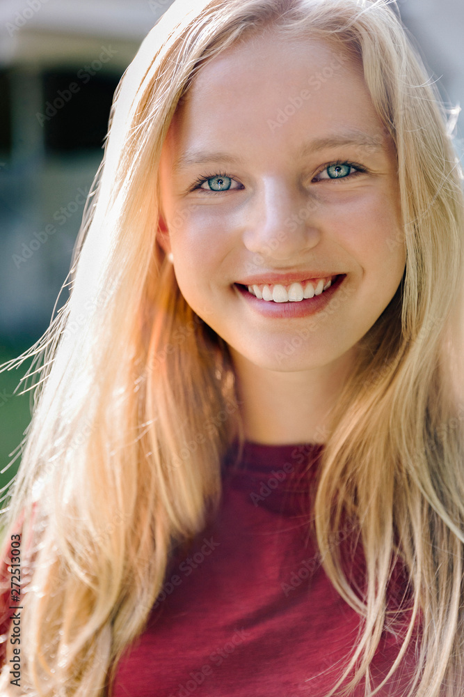 Portrait of beautiful Blond Teen with Blue Eyes Girl smiling Stock Photo | Adobe Stock