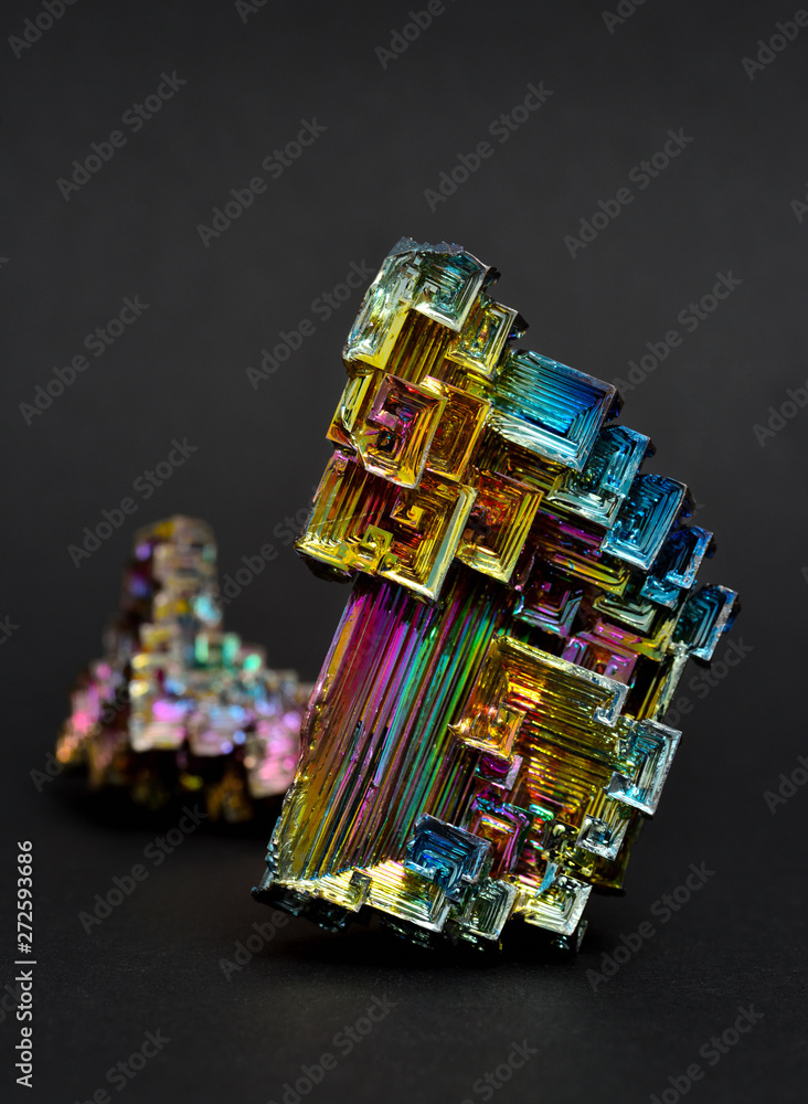 Bismuth crystals on a dark background. This is the most strongly ...