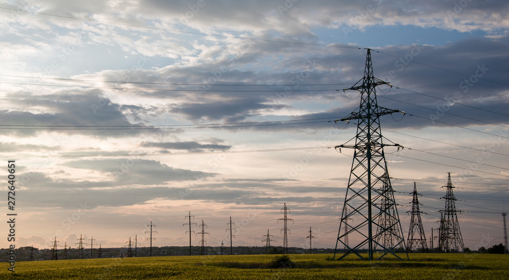 Powerful lines of electric gears.Power lines and sky with clouds.Wires ...