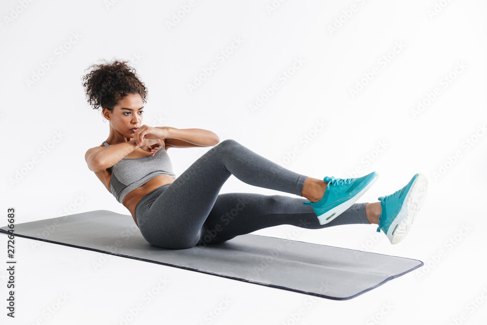Beautiful young fit african sportswoman Stock Photo | Adobe Stock