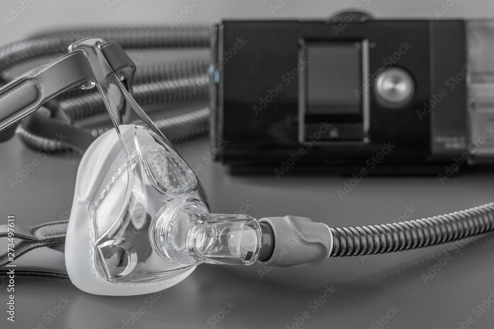 Sleep apnea CPAP mask on the grey table 素材庫相片 | Adobe Stock