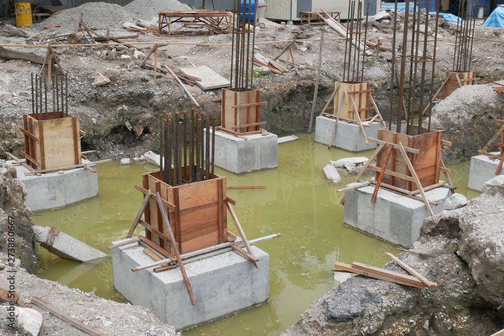Pile cap and column stump under construction at the construction site ...