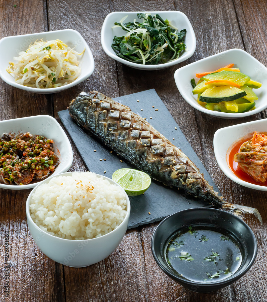 One set of saba grill serve with slide dish, kimchi, rice and seaweed ...