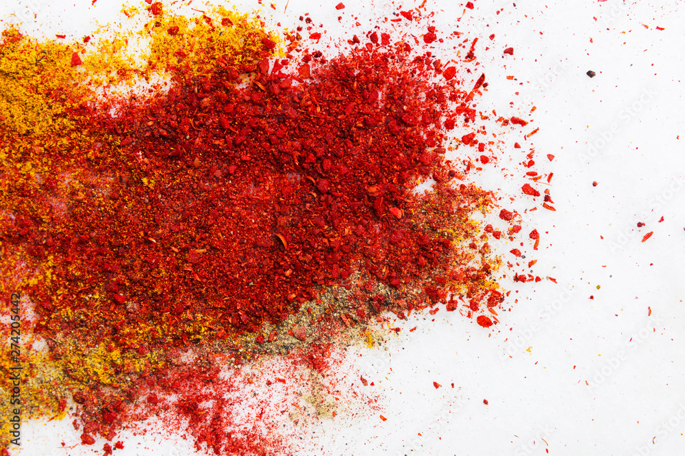 Variety of different ground spices in powder peppers paprika turmeric ...
