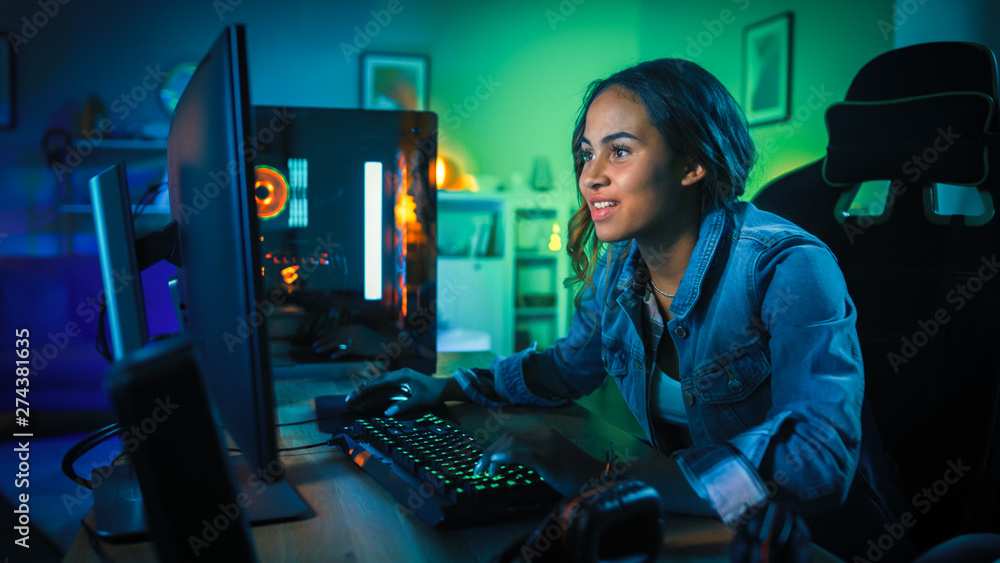 Beautiful and Excited Black Gamer Girl is Playing First-Person Shooter ...