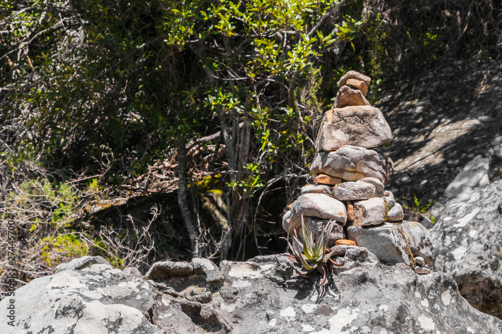 Stacked stones as a guide for hikers in Table Mountain National Park in ...