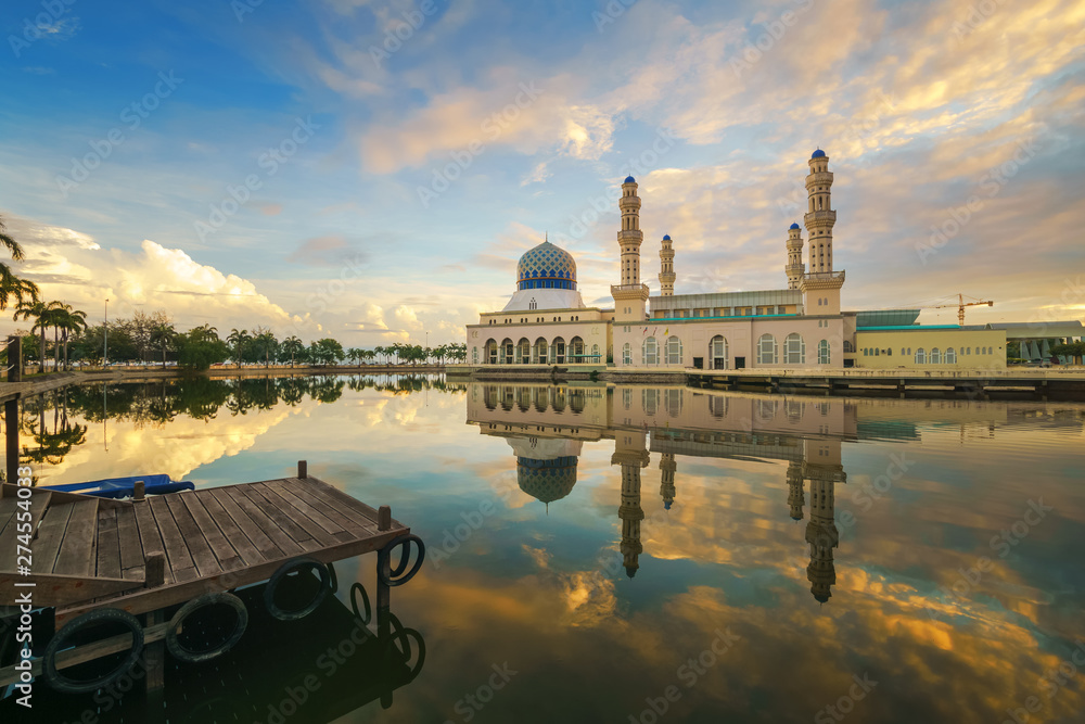 Colorful sunrise sky at Kota Kinabalu City Mosque, one of the main ...